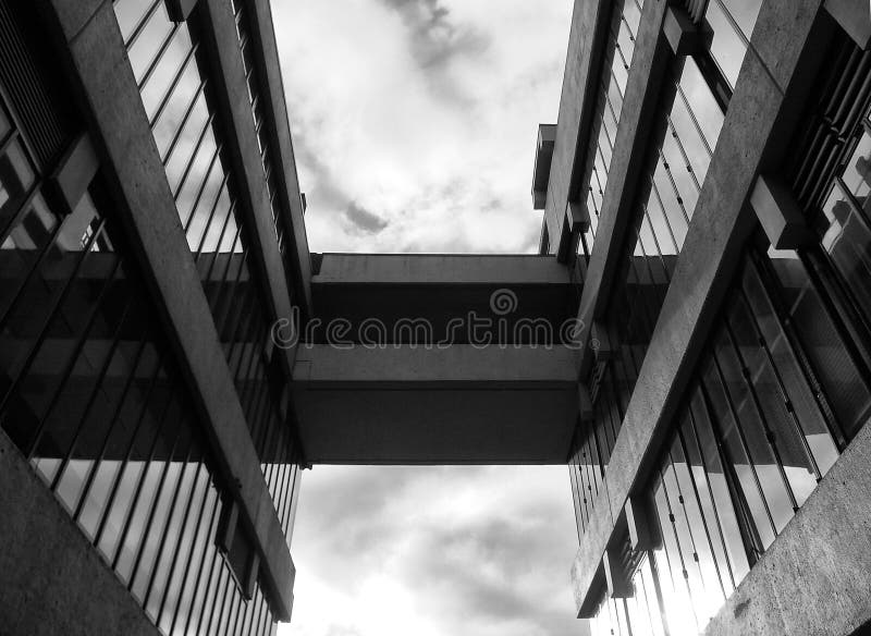 A Bridge between Two Modern Concrete Buildings Stock Image - Image of ...
