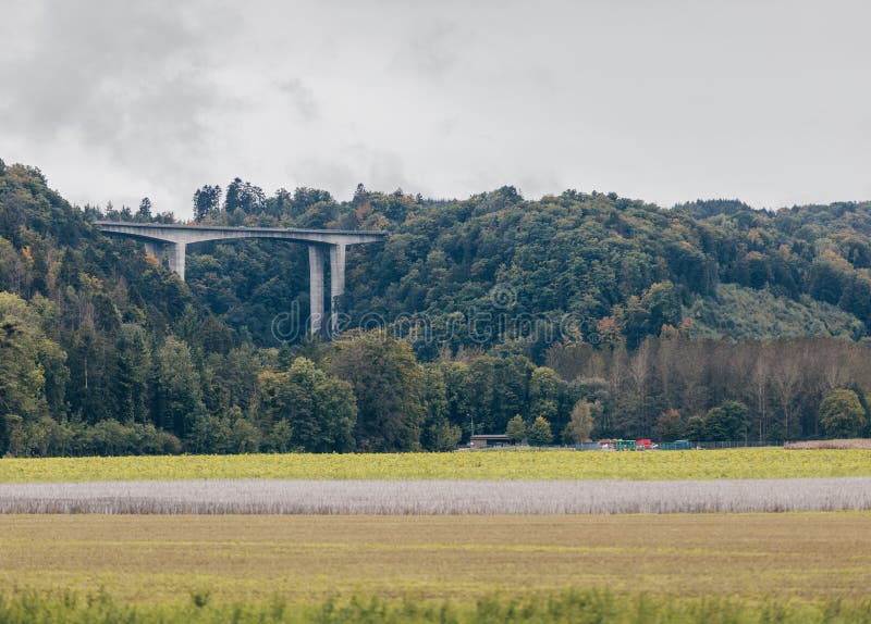 Bridge between Two Mountains Stock Image - Image of tree, field: 259897171