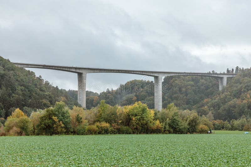 Bridge between Two Mountains Stock Photo - Image of mountains, farm ...