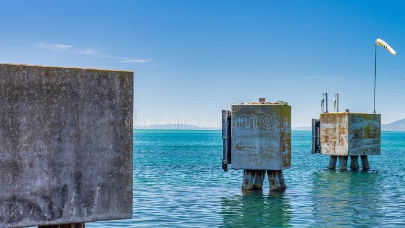 Bridge Under Construction Over the Ocean Stock Photo - Image of sunset ...