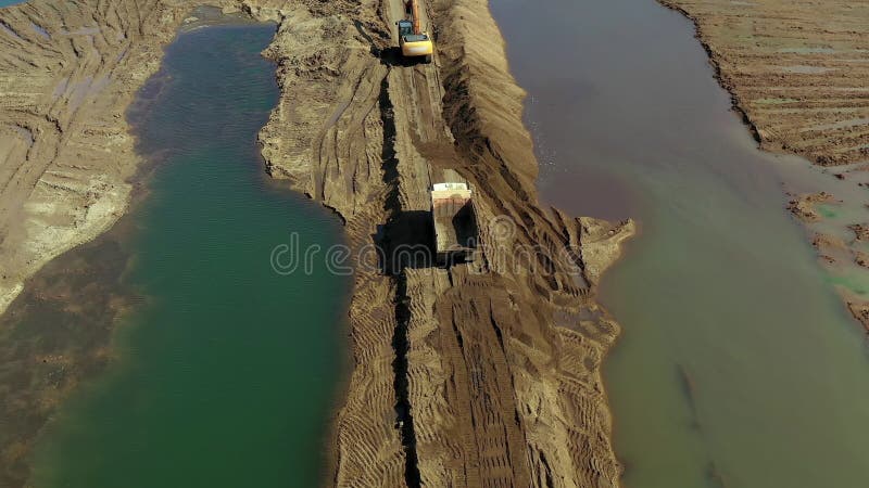 Bridge Under Construction Over a River. Equipment on the Bridge Under ...