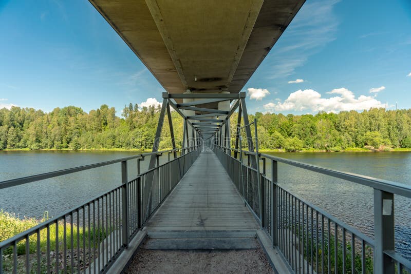 Bridge with Underneath Walking Path Crossing a River Stock Photo ...