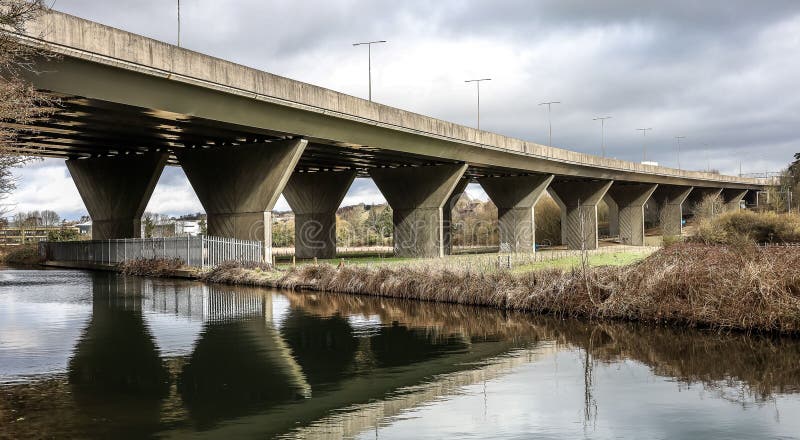 The Bridge is Very High Above the Water at this Time of Day Stock Photo ...