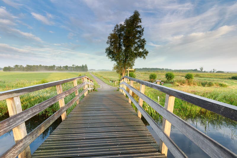 Bridge Via River in Morning Countryside Stock Photo - Image of blue ...