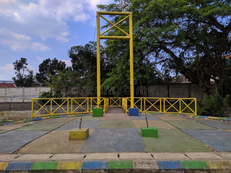 The Bridge is Yellow in a Park Stock Photo - Image of green, bridge ...