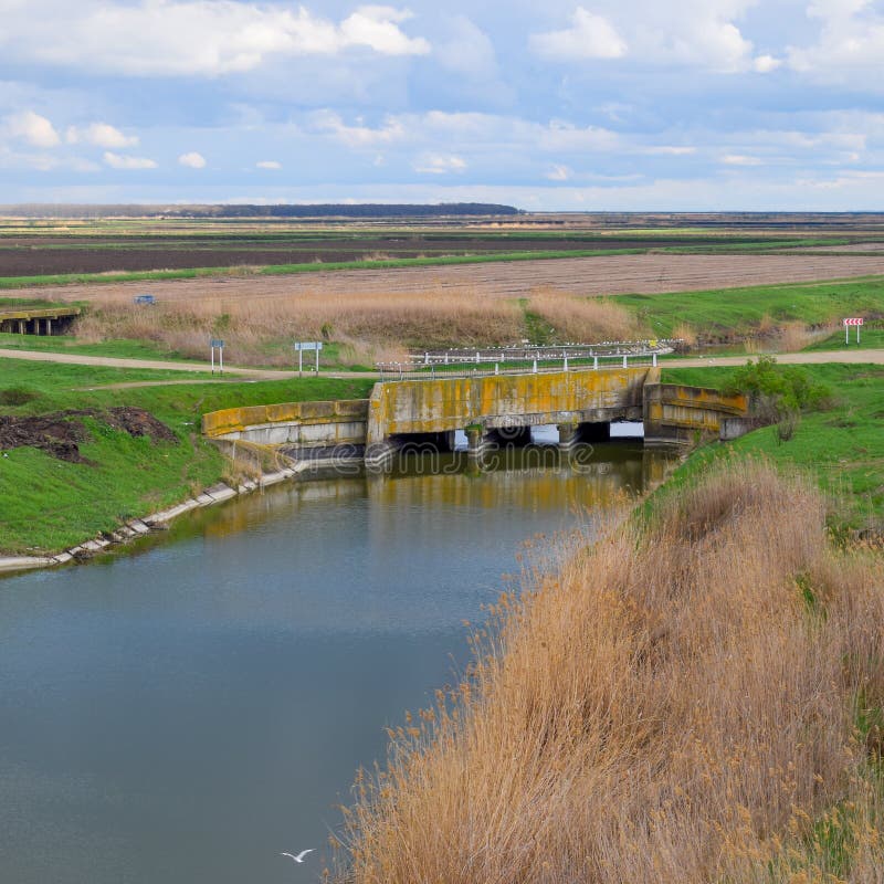 Bridges through Irrigation Canals. Rice Field Irrigation Stock Image ...