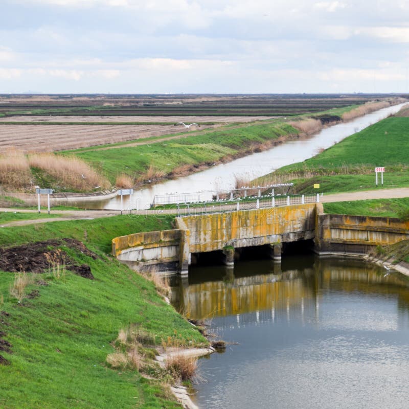 Bridges through Irrigation Canals. Rice Field Irrigation System Stock ...