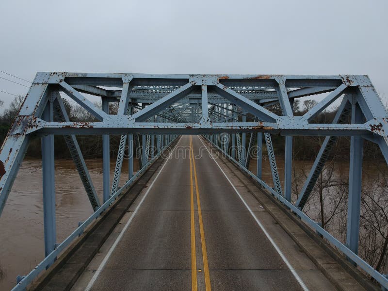 Bridging road over a lake stock image. Image of landscape - 135650087