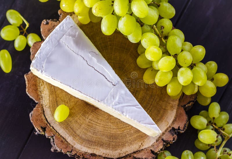 Brie cheese and grapes stock image. Image of peel, delicious - 175233749