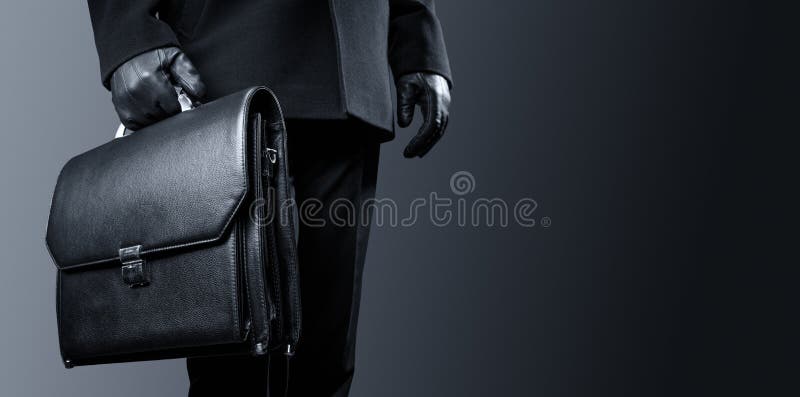 Briefcase with Documents in the Hand of a Business Man. Stock Image ...