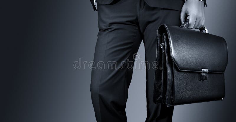 Briefcase with Documents in the Hand of a Business Man. Stock Image ...