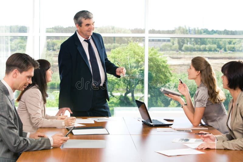 At briefing stock photo. Image of businessman, employee - 5669178