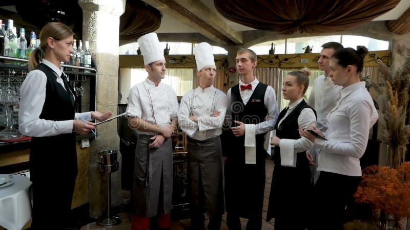 Briefing at the Restaurant. Interacting To Head Manager in Commercial ...