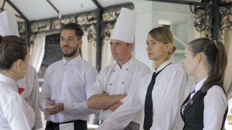 Briefing at the Restaurant. Interacting To Head Manager in Commercial ...