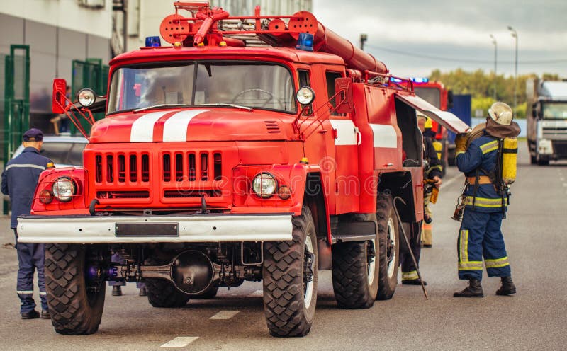 A Brigade of Firefighters Deploys Equipment for Tasks Stock Image ...