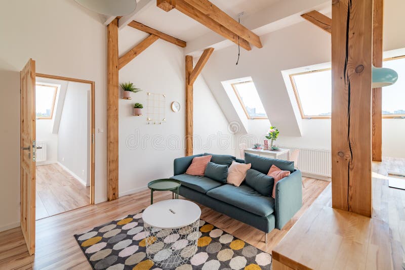 Attic Living Room with Textile Sofa and Coffee Table Stock Photo ...