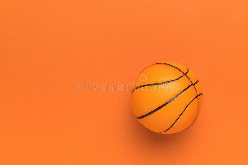 A Bright Basketball on Fire Glowing Against a Fiery Orange Background ...