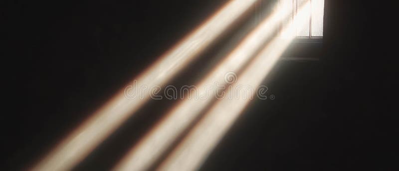 Bright Beams of Sunlight Filter through a Window, Creating a Cozy and ...