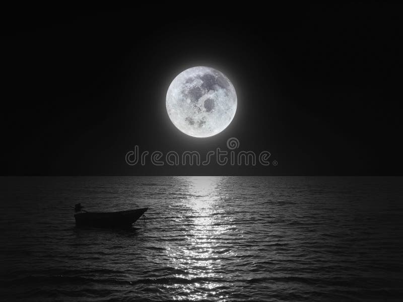 Bright and Beautiful Dramatic Super Moon Over the Ocean with Small Boat ...