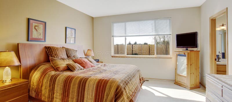 Bright Bedroom with Cheerful Striped Bed Stock Image - Image of room ...