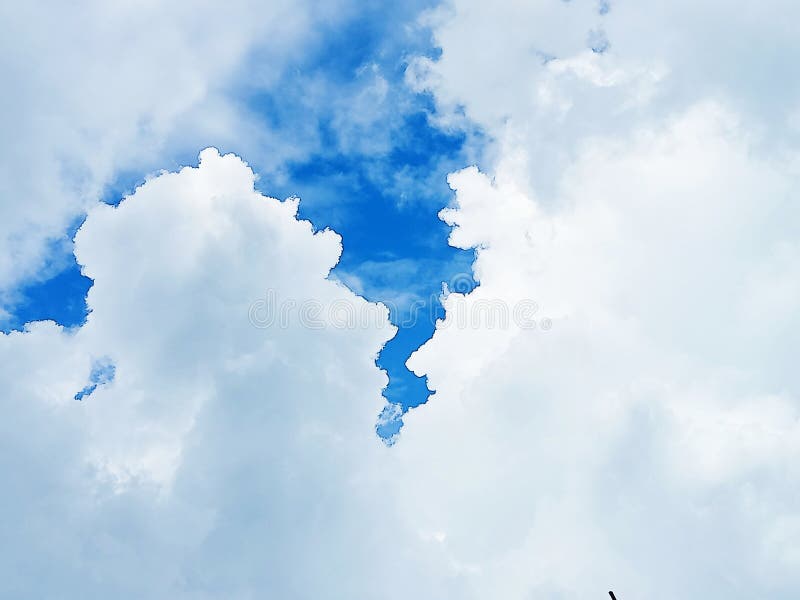 The Bright Belly is about To Be Obscured by White Clouds. Stock Photo ...
