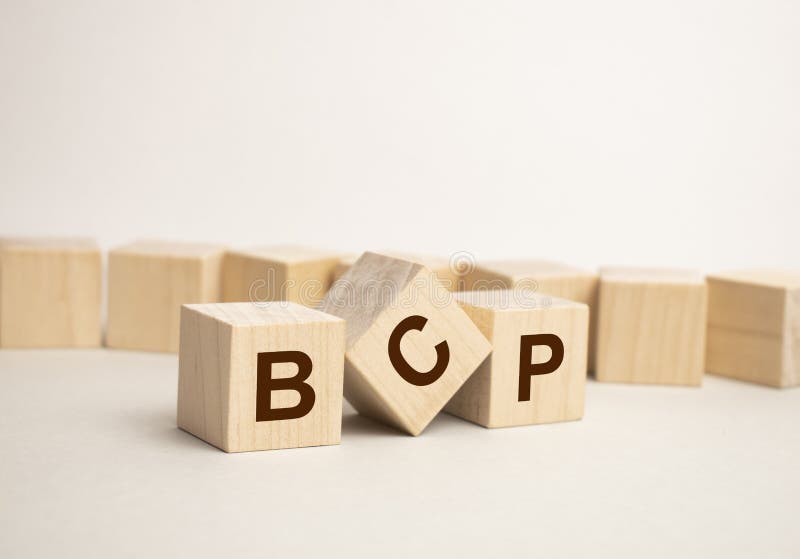 On a Bright Blue Background, Light Wooden Blocks and Cubes with the ...