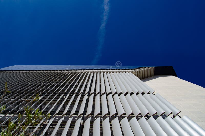 Bright Blue City Buildings with Clouds Stock Photo - Image of ...