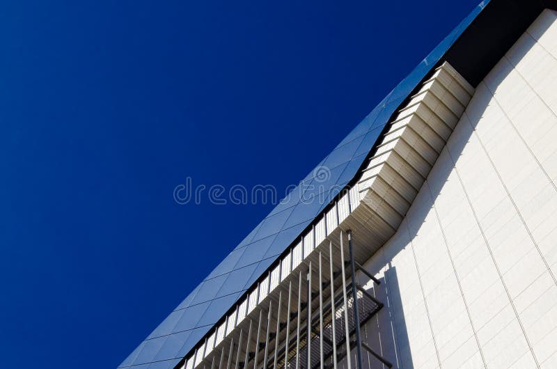 Bright Blue City Buildings with Clouds Stock Photo - Image of ...