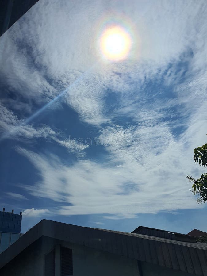 Bright Blue Cloudy Sky with Shinny Sun Stock Photo - Image of cloud ...