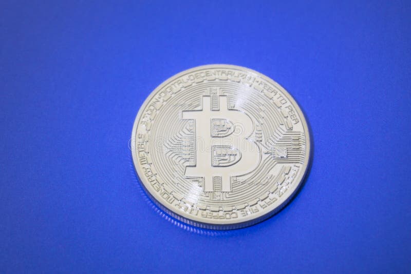 Bitcoins with Digital Ledger Connected To Laptop Device Stock Photo ...