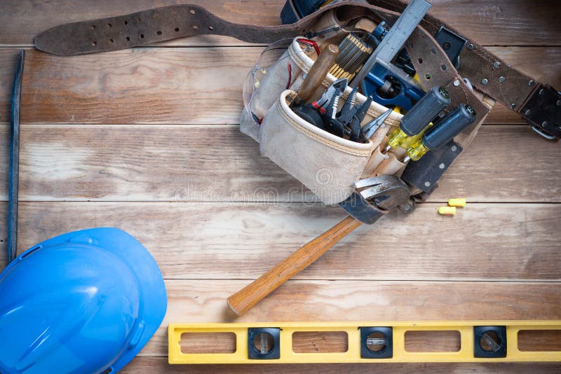Bright Blue Hardhat, Level, and Tool Belt with Various Tools. Labor Day ...