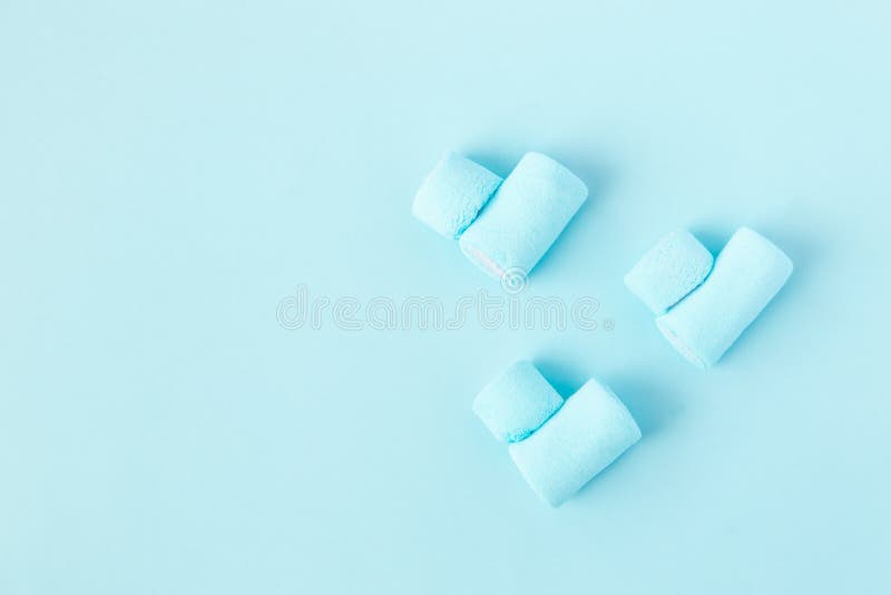 Bright Blue Marshmallows in the Shape of a Heart on a Blue Background ...