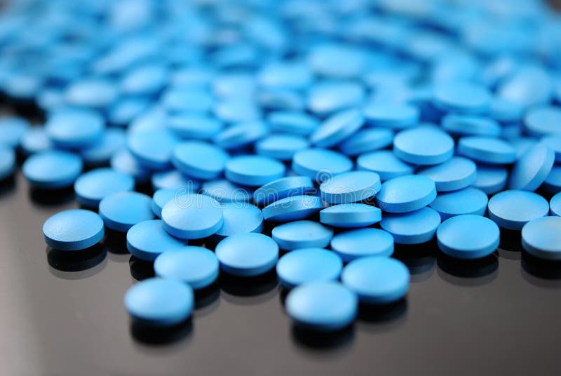 Bright blue round tablets stock image. Image of pain - 112382909