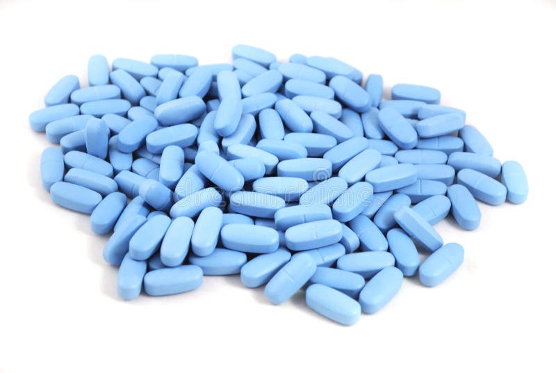Bright blue round tablets stock image. Image of care - 112382571
