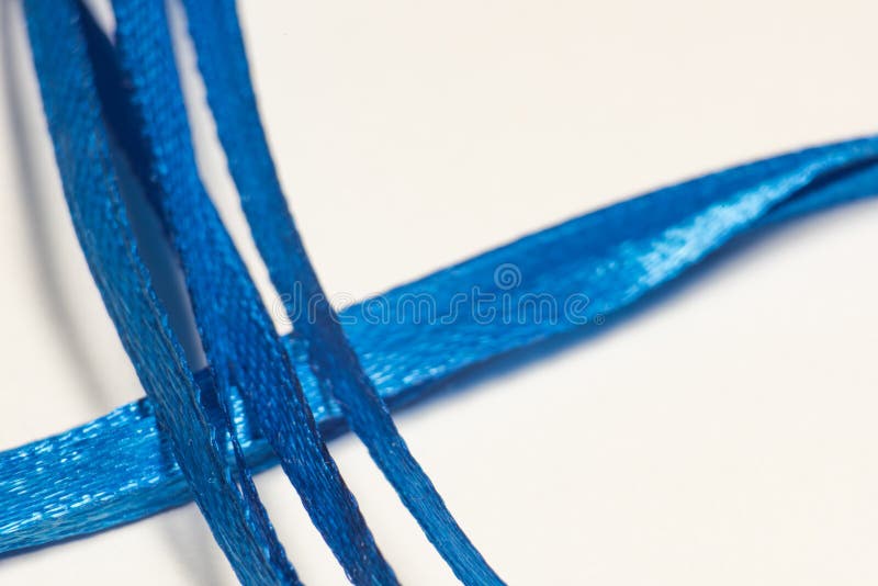 Bright Blue Ribbon Tape on a Light Background, Soft Focus Stock Photo ...