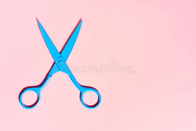 Bright Blue Scissors Over Pink Background with Copy Space Stock Photo ...