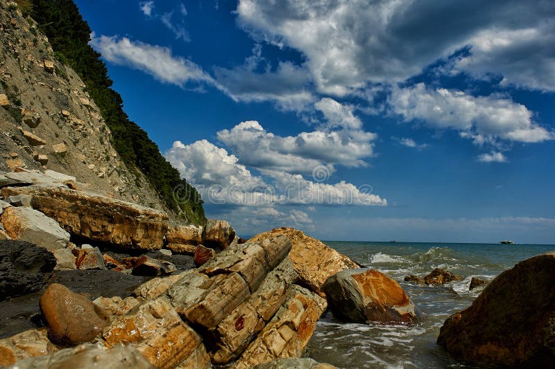 Bright Blue Skies, Sharp Rocks, Wet and the Beautiful Sea. Breathtaking ...