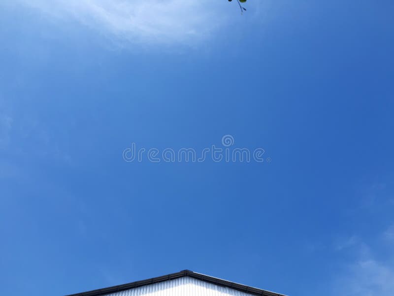 Bright Blue Sky and End Building Roof Stock Photo - Image of wave ...
