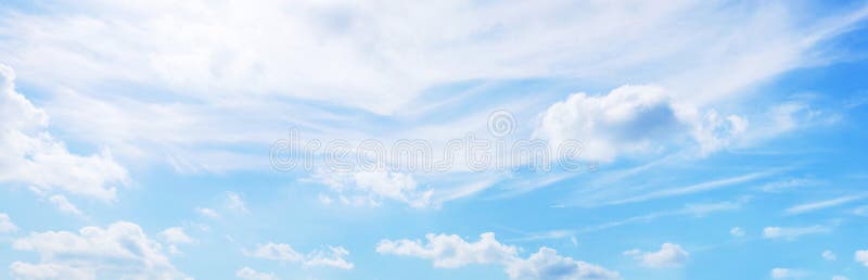 Bright Blue Sky Filled with Scattered, Wispy, Soft and Fluffy Clouds ...