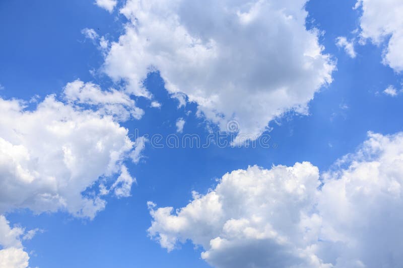 Bright Blue Sky with Fluffy White Clouds on a Clear Day Stock Image ...