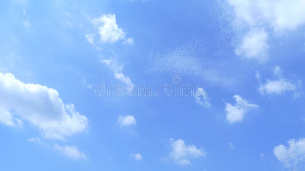 Bright Blue Sky with Small Irregular Clouds during the Daytime Stock ...