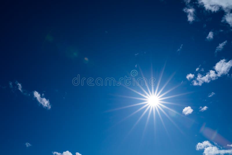 Bright Blue Sky With The Sun Causing Lens Flare Stock Image - Image of ...