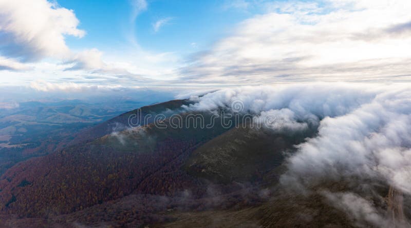 Thick Layer of White Clouds Above Road on Mountain Ridge Stock Image ...