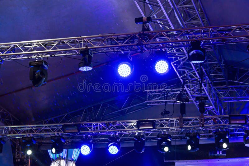 Bright Blue Stage Lights during the Rain Stock Photo - Image of ...