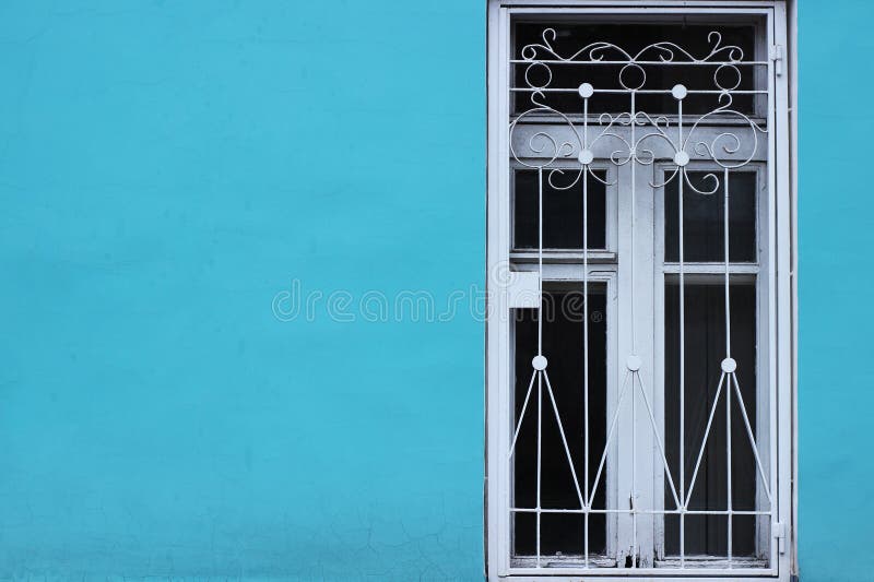 Bright Blue Wall and White Old Window with Bars. Minimalism Stock Image ...
