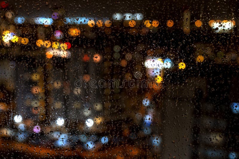 Bright Blurred City Landsape. Raining at Night Stock Photo - Image of ...