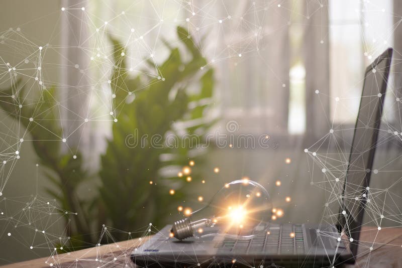 A Bright Bulb is Placed on the Notebook Computer. Ideas Inspired by ...