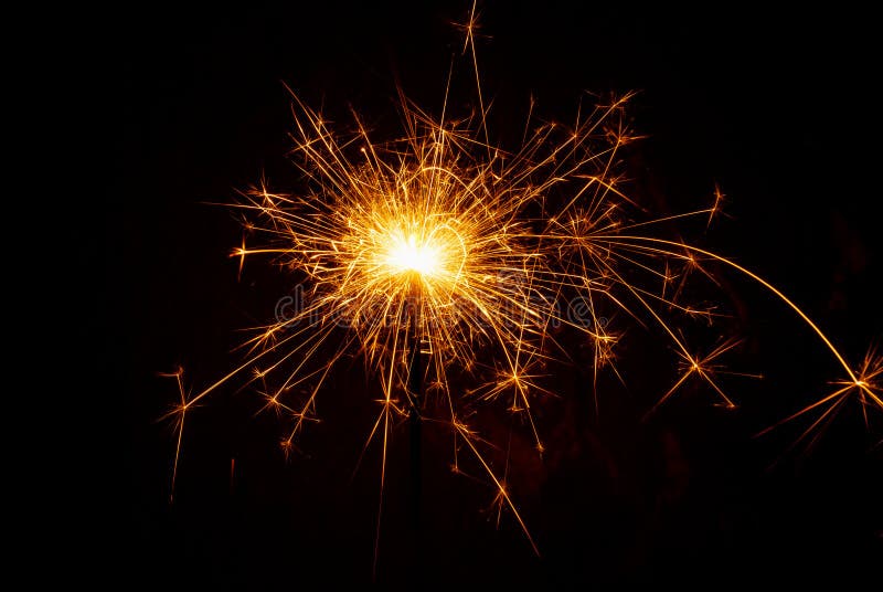 Bright Burning Sparkler on the Dark Background Stock Photo - Image of ...