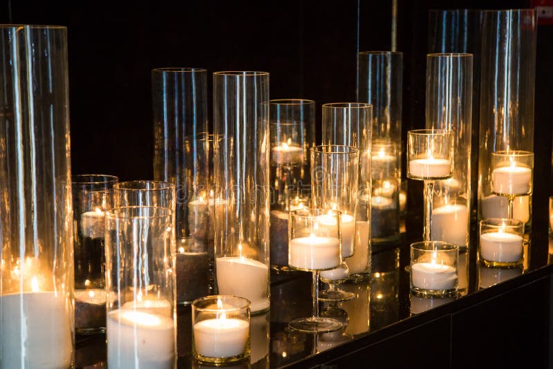 Bright Candles in High Candlesticks Stock Photo - Image of light ...