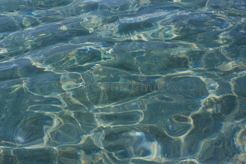 Bright Caustics on Water Surface in Blue Sea Stock Image - Image of ...